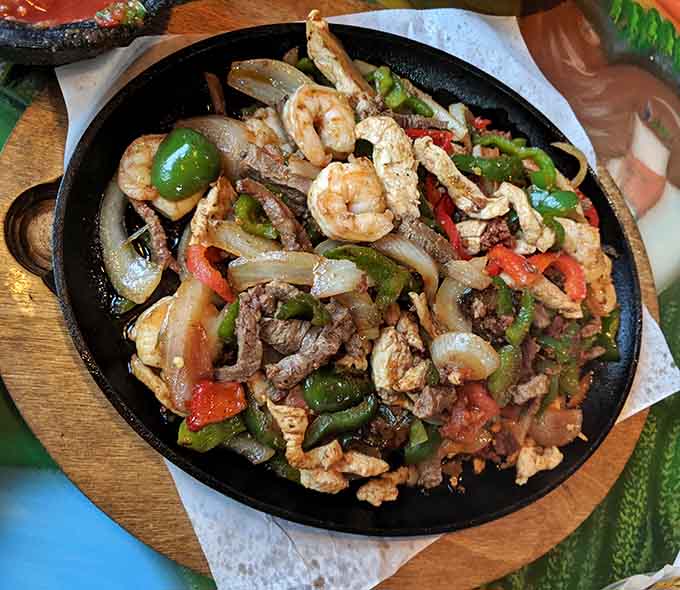 The Mazatlan Special Fajitas arrive sizzling like they're announcing their presence to the entire restaurant, and honestly, they've earned that entrance.