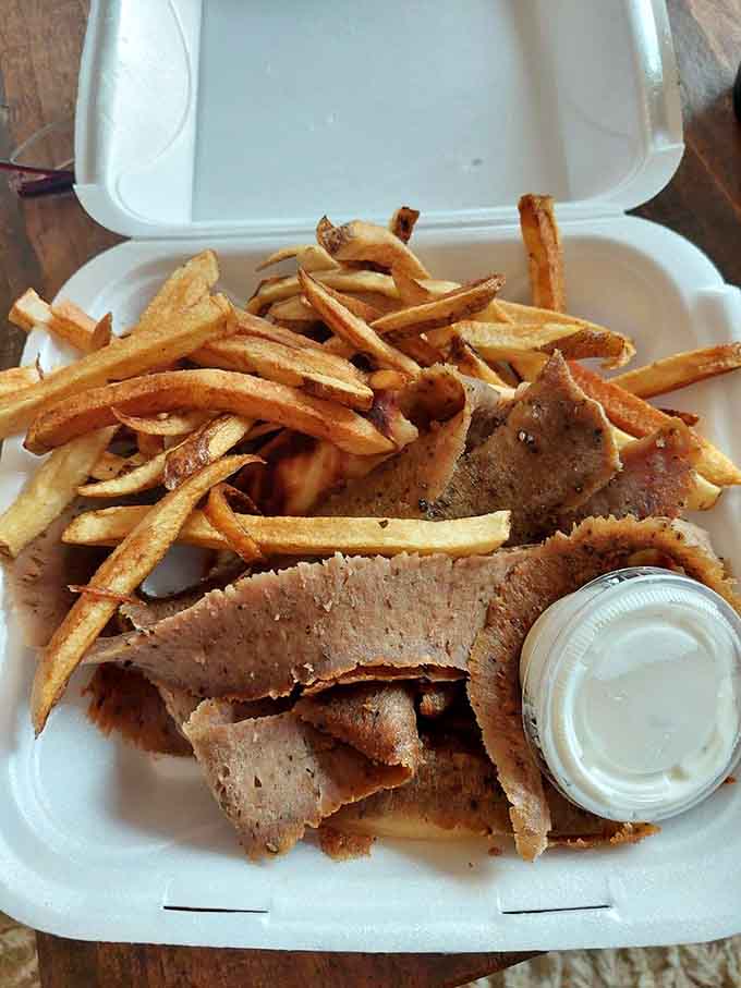 The gyro platter brings Mediterranean flavors to Minnesota, proving this kitchen's versatility extends beyond beef.