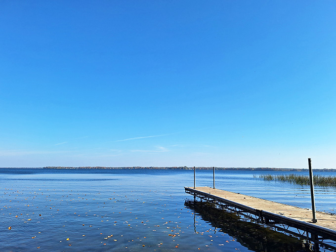 Clear blue skies meet calm waters in a view so perfect it almost looks Photoshopped, except this is gloriously, wonderfully real.