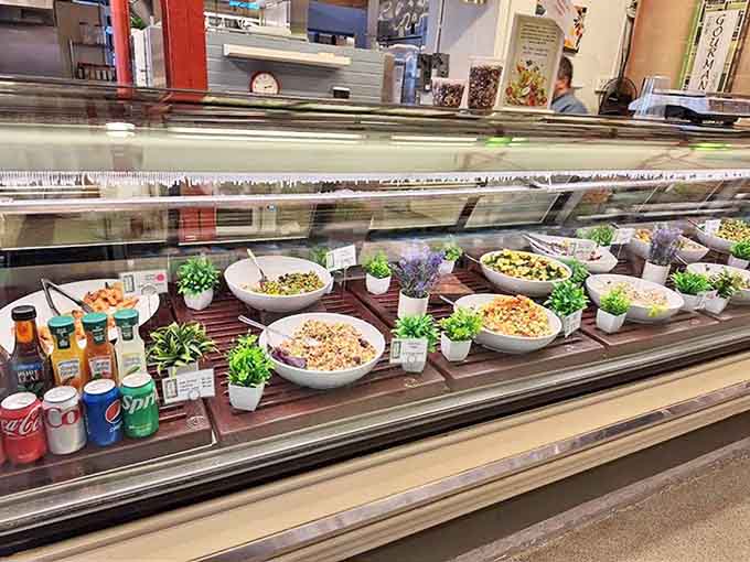 Prepared salads lined up like colorful soldiers, ready to rescue you from another night of "whatever's in the fridge" syndrome.