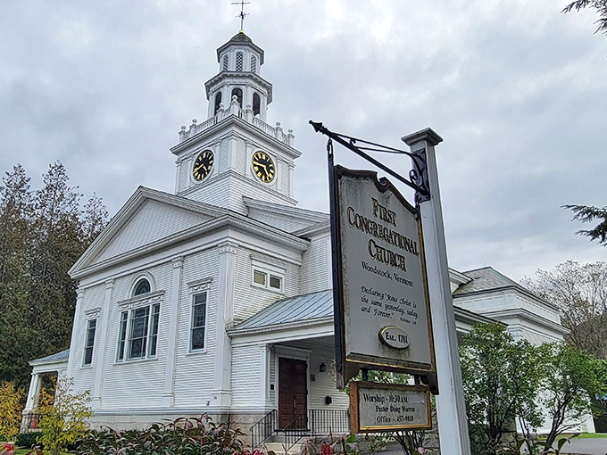The First Congregational Church stands as Woodstock's spiritual anchor, its white steeple reaching skyward like an exclamation point on the town's beauty.