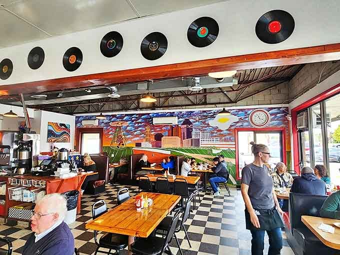 Where strangers become friends over coffee refills. That mural tells stories of the city while you create stories of your own.