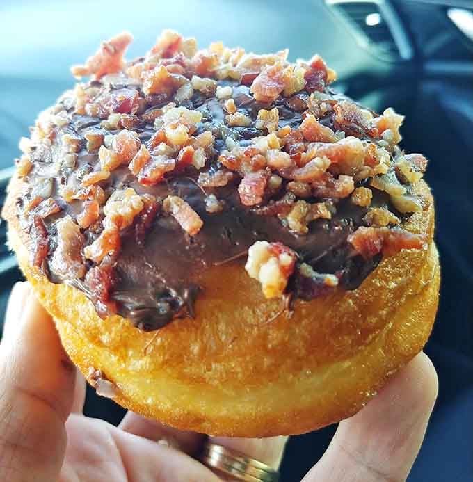 Held in hand, this beauty reveals its generous bacon topping &ndash; proof that sometimes more really is more when it comes to breakfast meats.