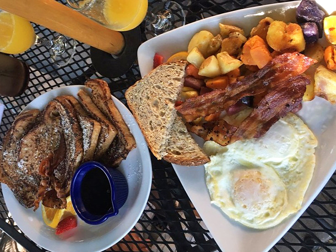 A breakfast spread that covers all bases: golden French toast for the sweet tooth and a hearty traditional breakfast for those craving something savory.