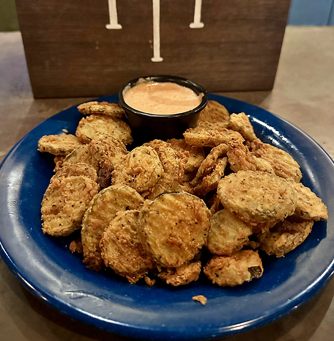 Tangy dill slices wearing crispy golden jackets, these fried pickles are the sassy cousins to those famous onion rings.