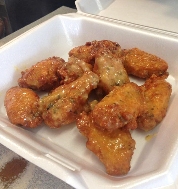 These wings aren't just an appetizer, they're a revelation &ndash; crispy, saucy perfection that might make you forget you came for the burgers.