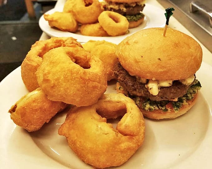 Golden halos of crispy perfection surrounding the burger that launched a thousand return visits.