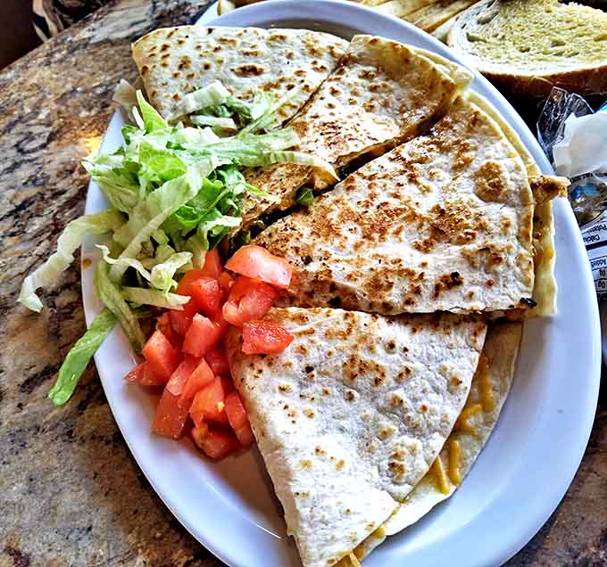 This quesadilla brings a touch of fusion to the table, proving Tim's isn't afraid to cross culinary borders.
