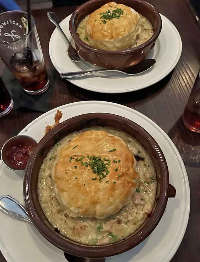 The perfectly baked crust glistens like edible gold, ready to shatter under your fork and reveal its delicious secrets.