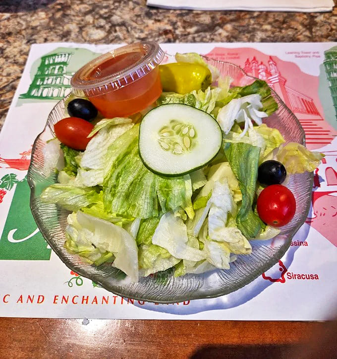 Crisp vegetables and tangy dressing create the perfect opening act before the pasta main event.