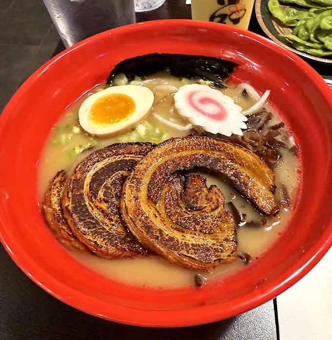 The swirl of chashu pork arranged like a delicious rose proves that ramen can be both beautiful and belly-filling.