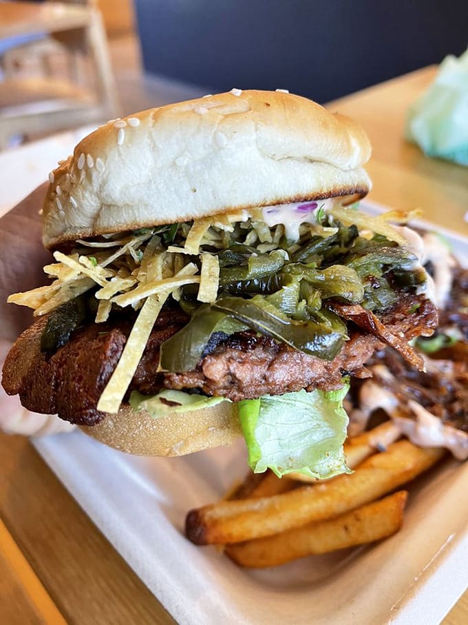 That burger stacks up like a delicious architectural marvel, proving vegetables can be just as indulgent as anything else.