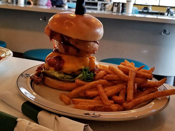 The towering masterpiece that is their specialty burger – requiring a moment of silent appreciation before the first magnificent bite.