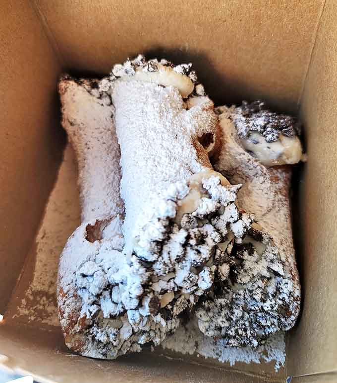 Cannoli that transport you straight to Little Italy&mdash;crisp shells giving way to sweetened ricotta cream. The powdered sugar dusting is just showing off.