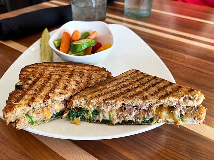 Golden-grilled perfection meets fresh greens in this panini that understands the assignment and aces the test.