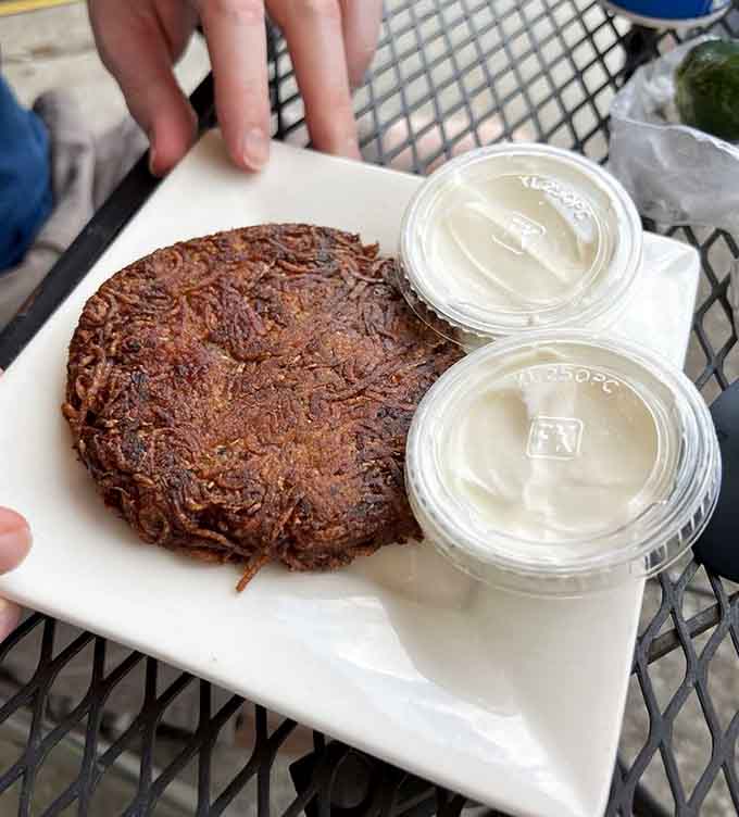 The potato knish brings golden-brown comfort to your plate, proving that simple pleasures are often the best pleasures.