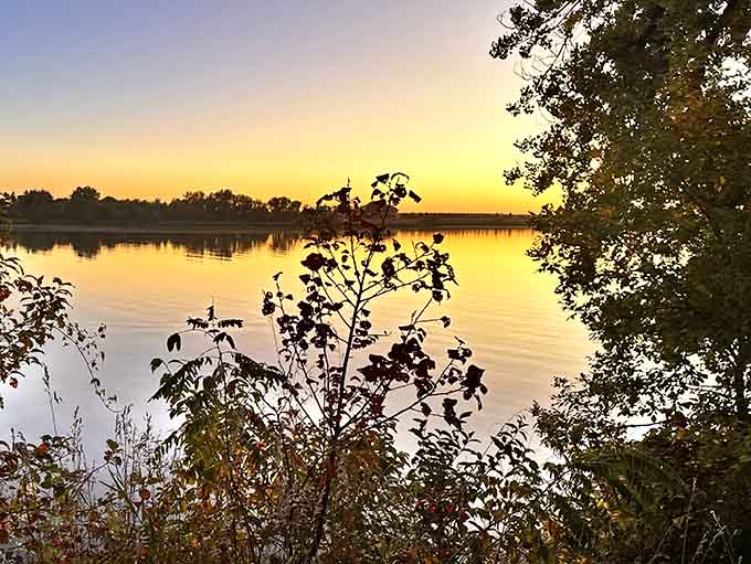 Golden hour transforms ordinary landscapes into extraordinary vistas, the kind of view that makes you understand why people have been painting and photographing sunsets since forever.