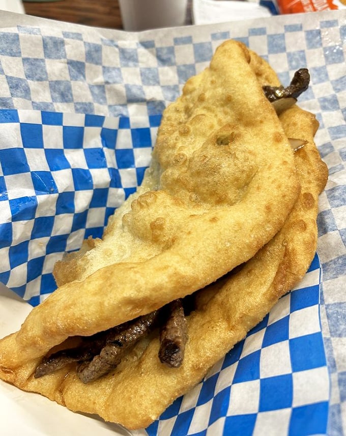 The lamb sandwich wraps tender meat and roasted green chilies in pillowy frybread &ndash; a handheld masterpiece that puts ordinary sandwiches to shame.