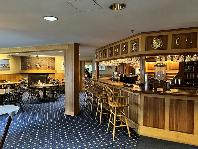 The lodge bar invites guests to gather around wooden tables, where house-brewed beers flow and strangers become friends.