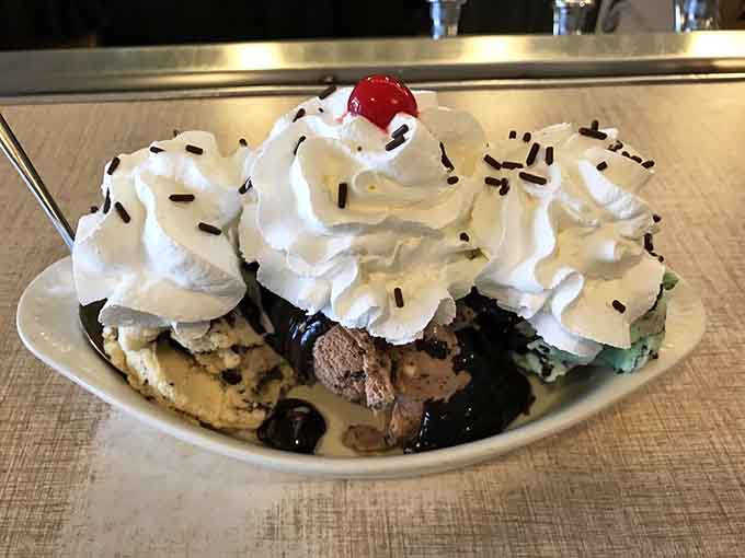 This towering sundae creation proves that more is more when it comes to ice cream, whipped cream, and happiness.