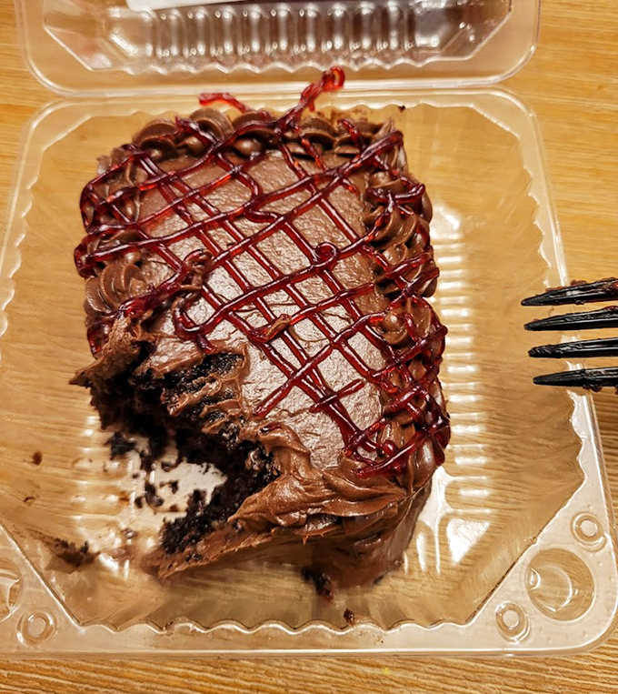 This chocolate cake with raspberry drizzle isn't just dessert &ndash; it's therapy you can eat with a fork.