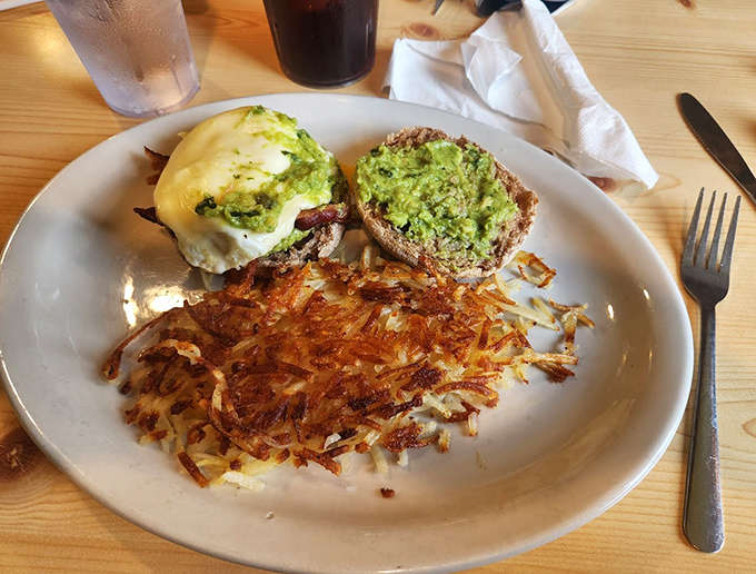 Crispy-edged hashbrowns with avocado toast and eggs&mdash;proof that Merlin's can do trendy breakfast without sacrificing their homestyle soul.