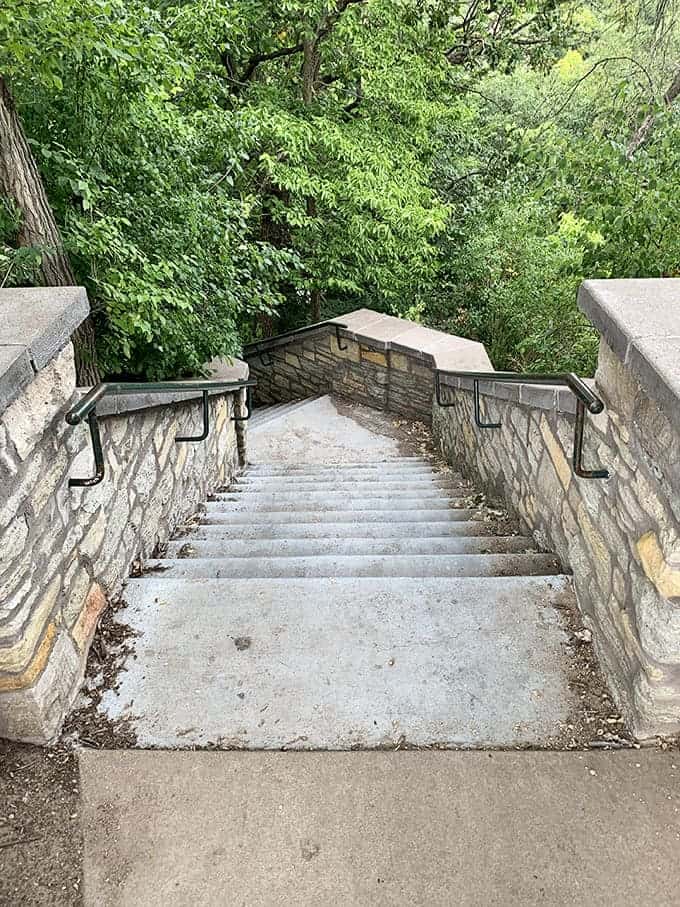 These stairs lead down to the base of the falls, and every step brings you closer to that misty, thundering magic that awaits below.