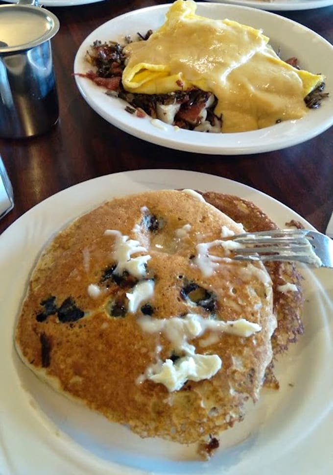 When your omelet arrives this loaded and your pancakes look this good, you know someone in the kitchen actually cares about breakfast.