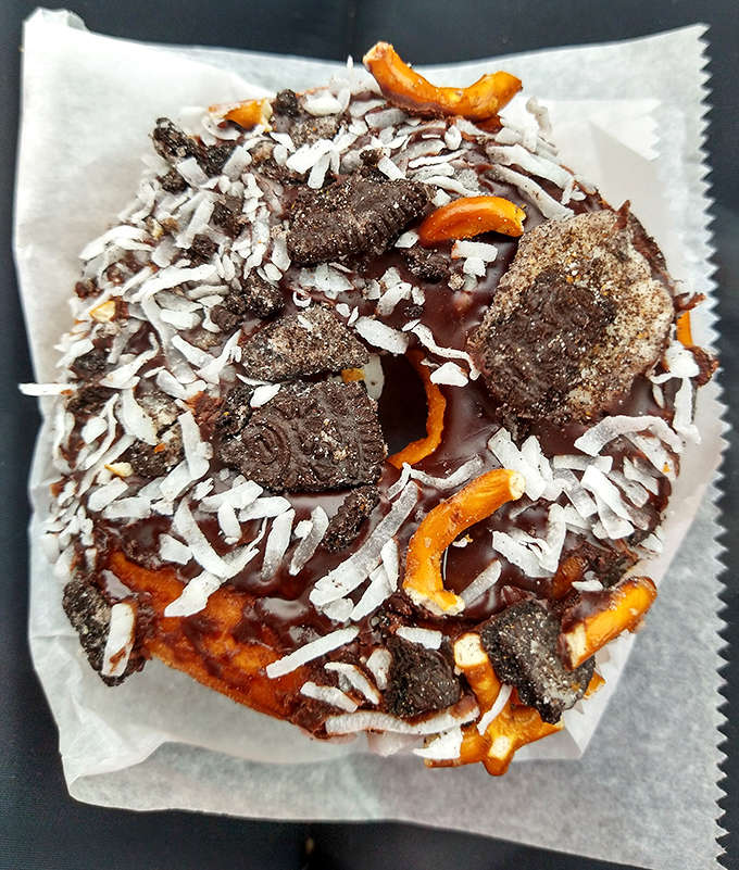 The Moose Munch donut &ndash; where chocolate, coconut, and cookie chunks throw a party so good, your diet wasn't invited. Worth every delicious calorie.