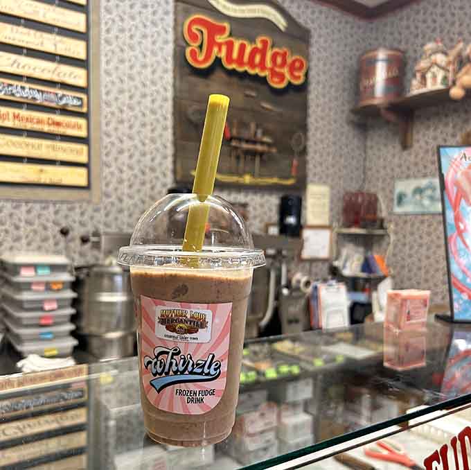 The Frizzle takes fudge into beverage territory, creating a frozen drink that's basically dessert you can sip through a straw.