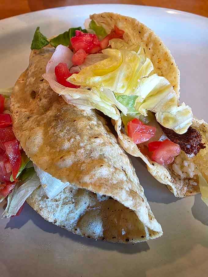 These tacos arrive ready to deliver that perfect combination of crispy shell, seasoned filling, and fresh toppings that make every bite satisfying.