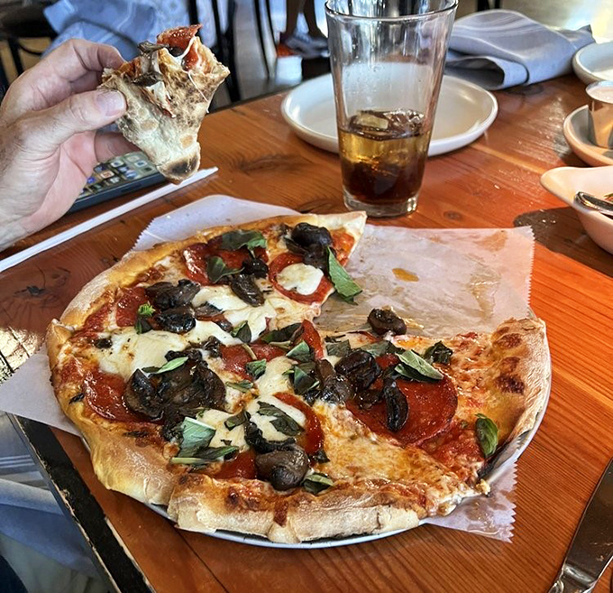 The mushroom and pepperoni pizza demonstrates The Parlor's philosophy: simple ingredients, impeccably sourced, treated with respect and a touch of culinary magic.