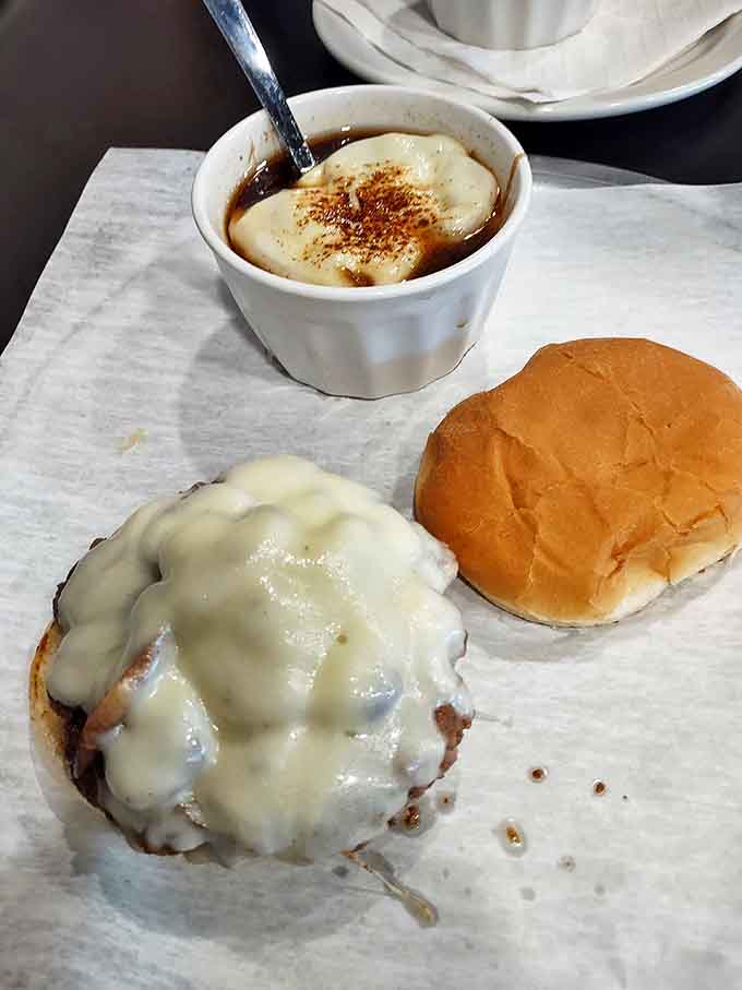 Even the burgers get the smoke treatment here &ndash; juicy beef topped with melty Swiss and mushrooms that have found their perfect home.