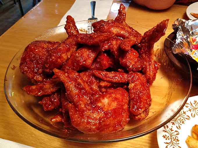 These beautifully sauced wings glistening with sauce, cooked to crispy perfection, ready to ruin you for all other wings.