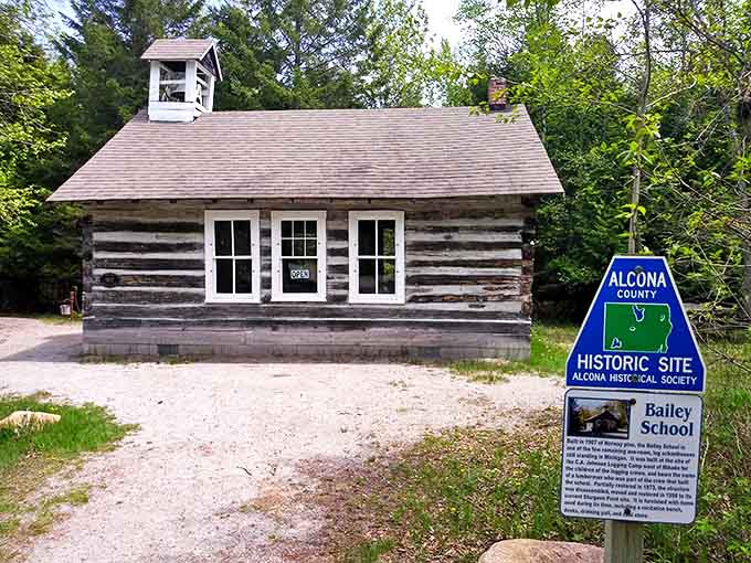 History neighbors history at Sturgeon Point, where the rustic Old Bailey Schoolhouse complements the lighthouse's maritime tale.