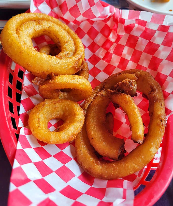 Golden halos of crispy, beer-battered perfection that make you wonder why vegetables ever bothered trying to be healthy in the first place.