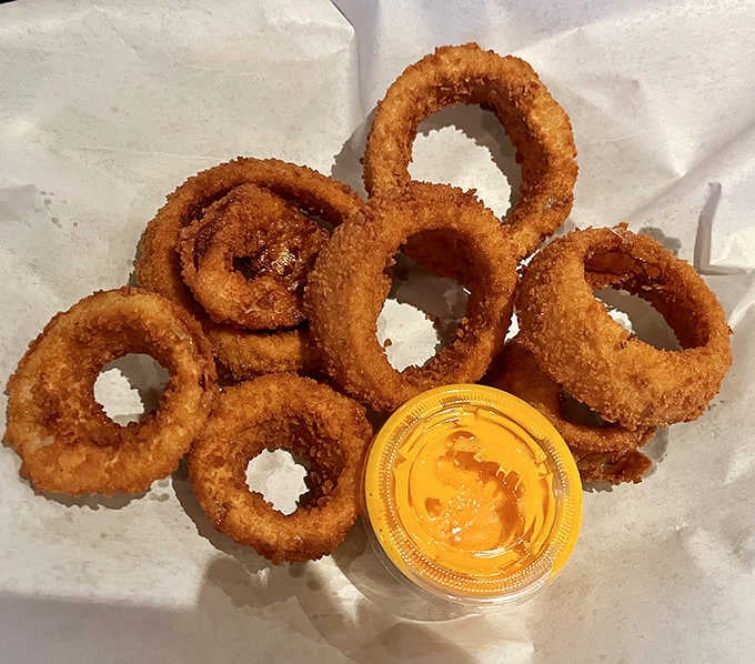 Golden onion rings with the perfect crunch-to-tenderness ratio &ndash; like edible jewelry for your taste buds.