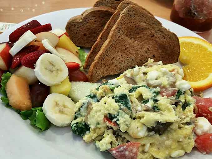 A protein-packed morning masterpiece featuring eggs, fresh vegetables, and melty cheese that puts sad desk breakfasts to shame.
