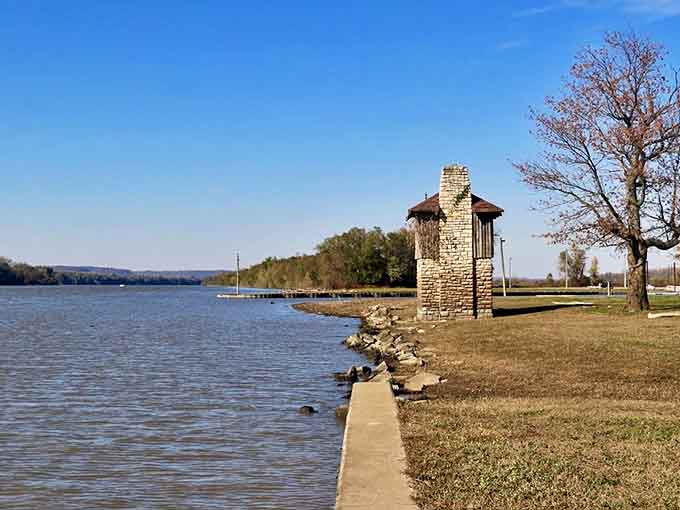 Riverside serenity where water meets stone, creating the perfect spot for contemplation or skipping rocks like a kid again.