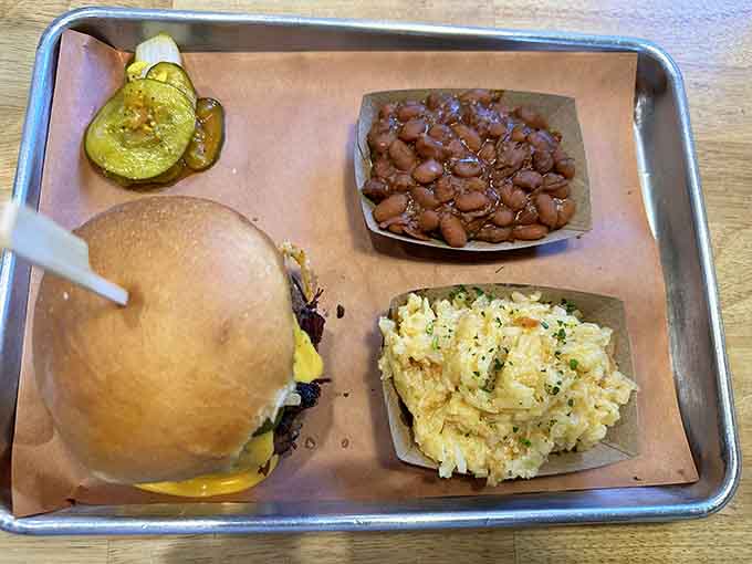 A double cheeseburger so perfectly constructed it could teach a masterclass in burger architecture and cheese distribution.