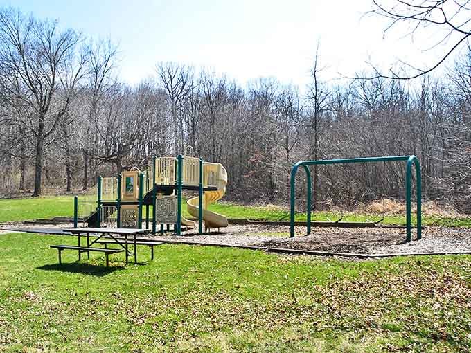 The playground gives kids a place to burn energy while parents enjoy the rare luxury of sitting down outdoors.
