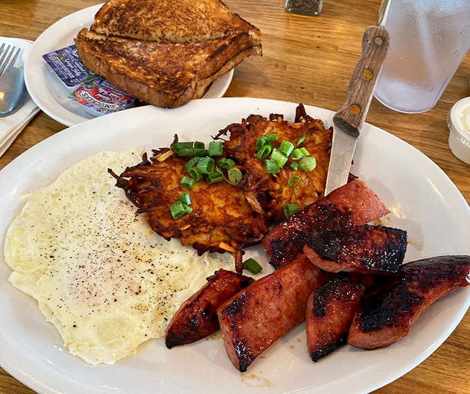 A breakfast trinity: crispy potato pancakes, perfectly fried eggs, and Polish sausage &ndash; comfort food that speaks to Michigan's cultural heritage.
