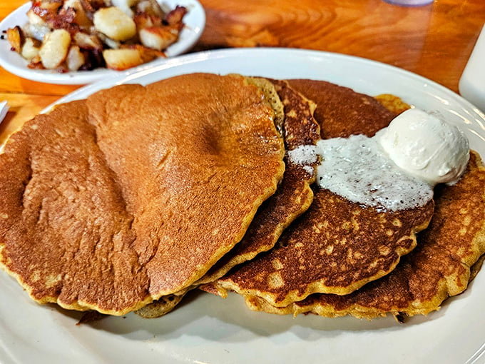 Golden-brown pancakes arrive steaming hot, ready for their maple baptism &ndash; a Vermont tradition that borders on religious experience.