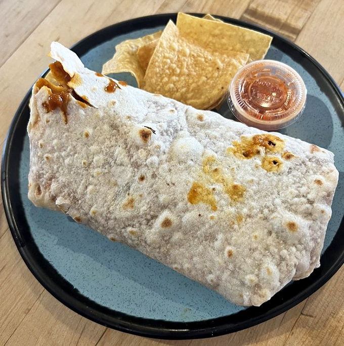 Red sauce so rich it should pay taxes, wrapped around beef so tender it practically surrenders at the touch of your fork.