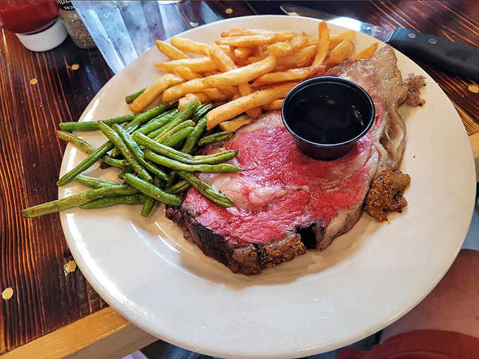 Carnivore poetry on a plate &ndash; this perfectly pink ribeye with vibrant green beans proves inland restaurants can nail a steakhouse classic.