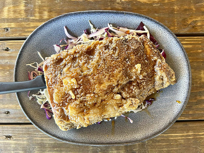 Fall-off-the-bone ribs slathered in house barbecue sauce – proof that behind the humorous name lies serious culinary skill.