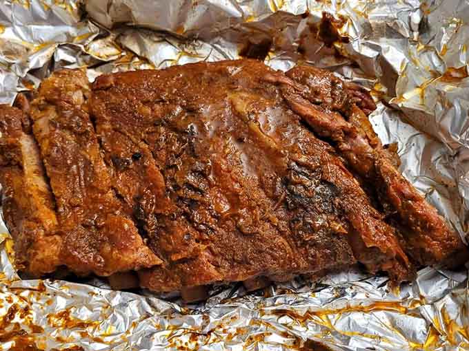 Mac and cheese so creamy and golden-topped it could make a grown person weep tears of joy into their napkin.