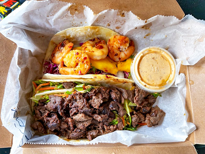 Shrimp & Korean BBQ tacos: The ultimate surf and turf combo in handheld form – plump shrimp and savory beef sharing space in tortilla paradise.