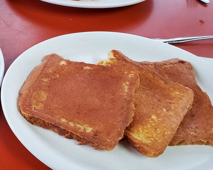 French toast done right, with that perfect golden-brown color that promises crispy edges and fluffy centers in every bite.