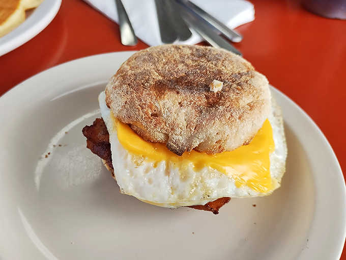 The English muffin sandwich &ndash; where humble ingredients combine for breakfast magic that puts fancy brunch spots to shame.